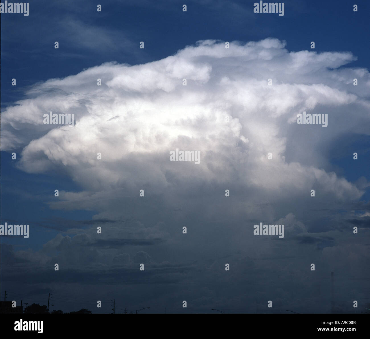 towering thunderhead over ocean Stock Photo - Alamy