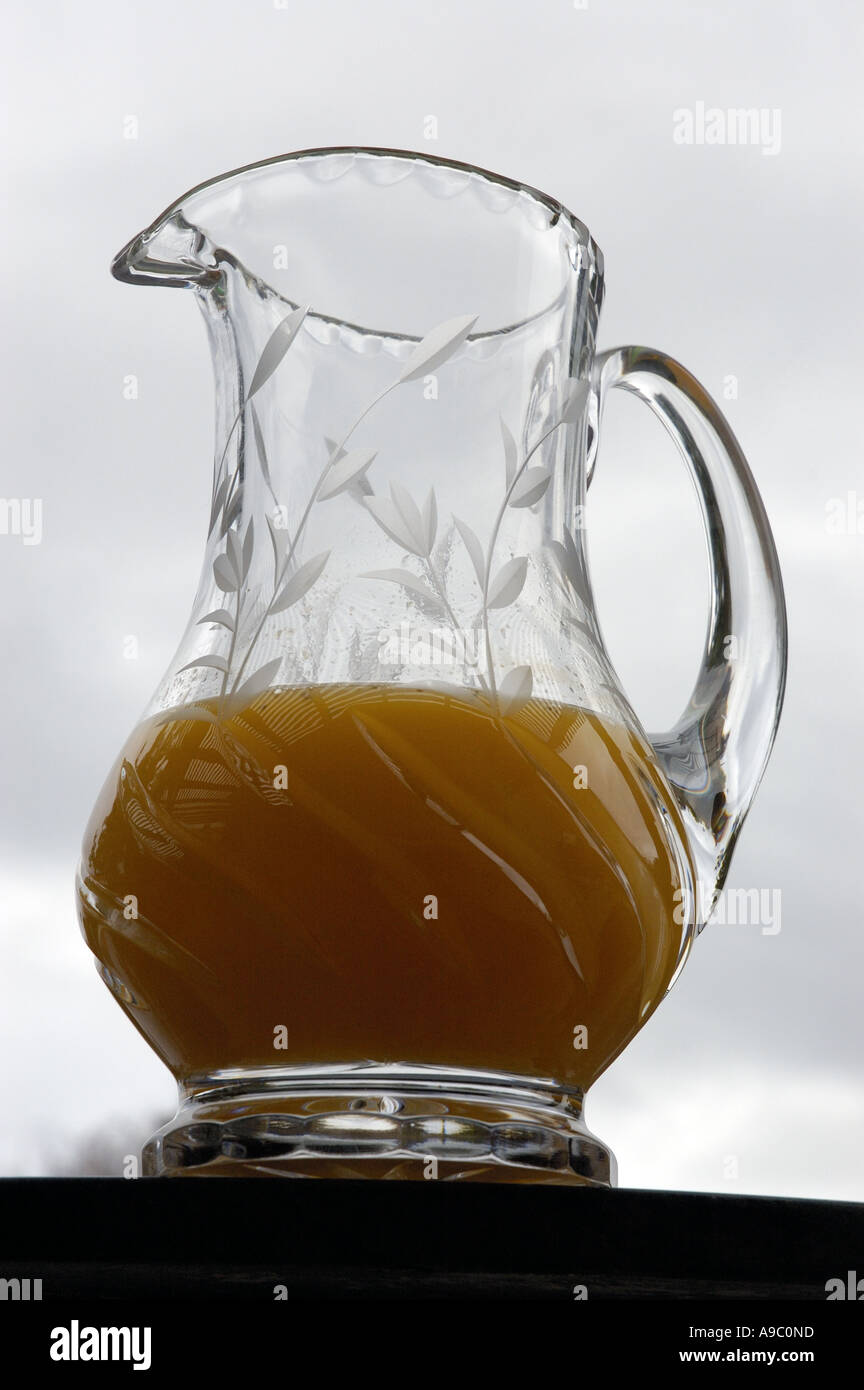 Crystal Pitcher of Orange Juice Stock Photo - Alamy