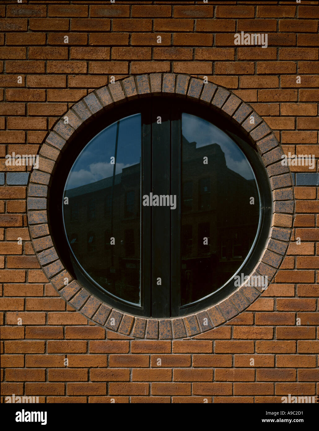 Circular window and brickwork Stock Photo - Alamy