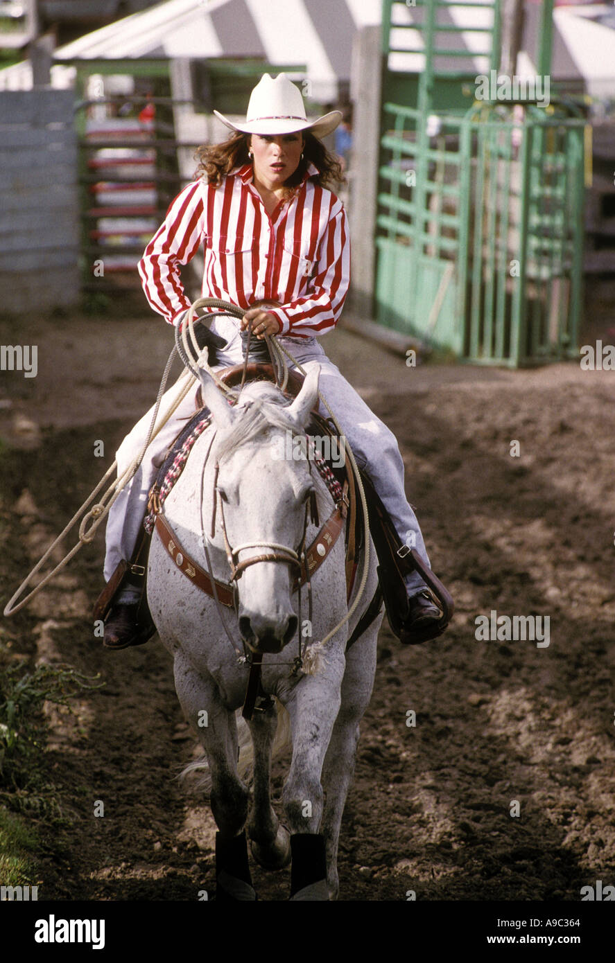 Colorado Snowmass Rodeo female calf roper on horseback Stock Photo - Alamy