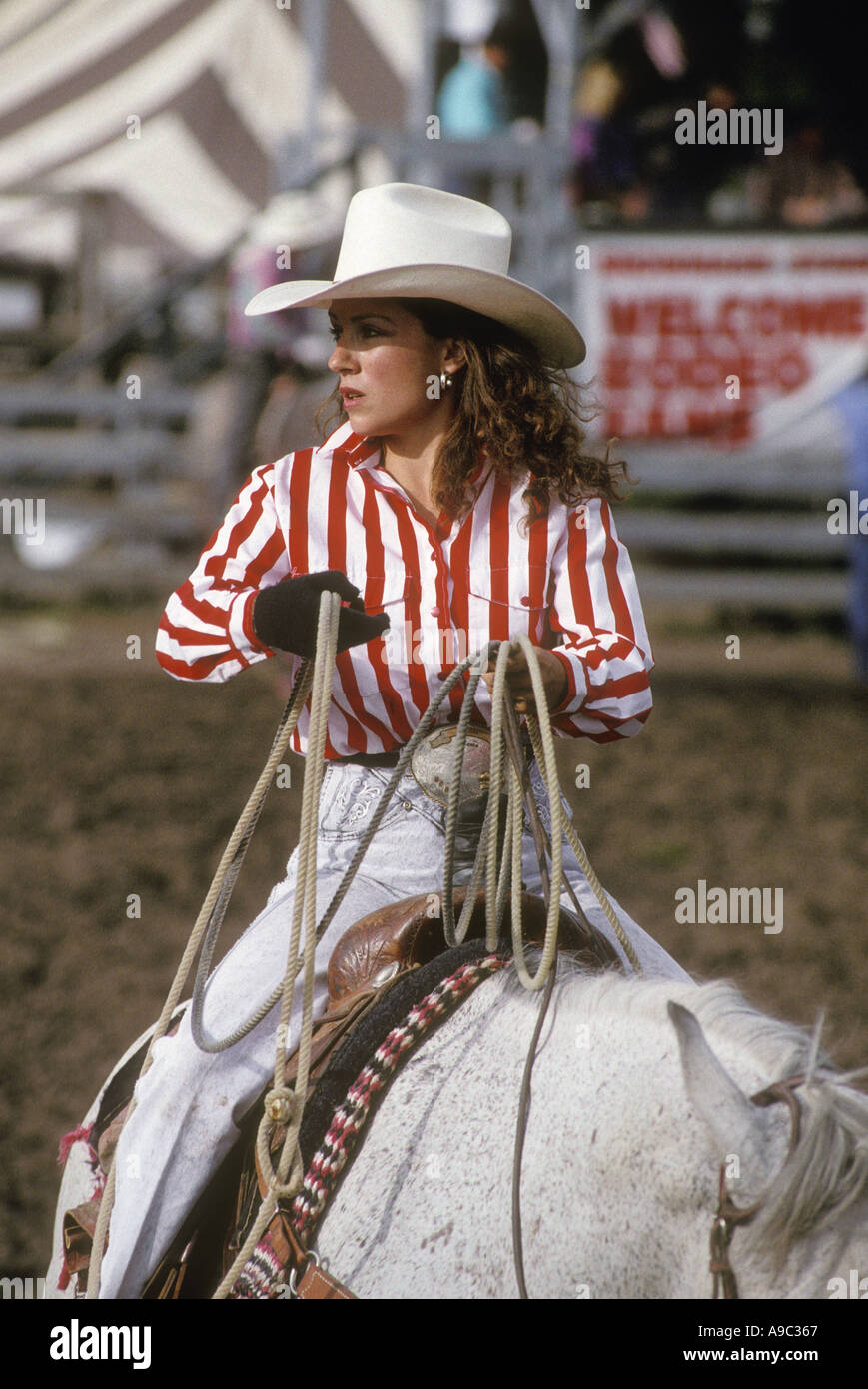 Colorado Snowmass Rodeo female calf roper on horseback Stock Photo - Alamy