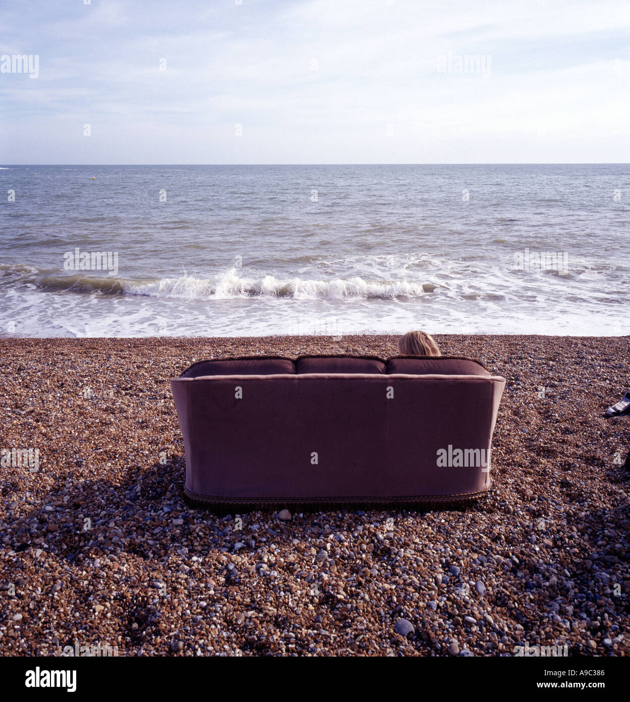Sofa on the beach in Brighton, U.K Stock Photo - Alamy