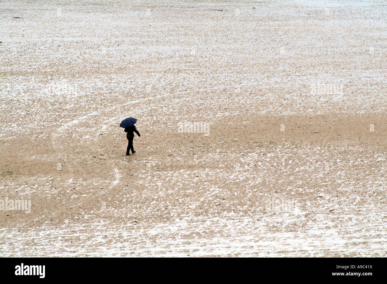 Figure on beach landscape hi-res stock photography and images - Alamy