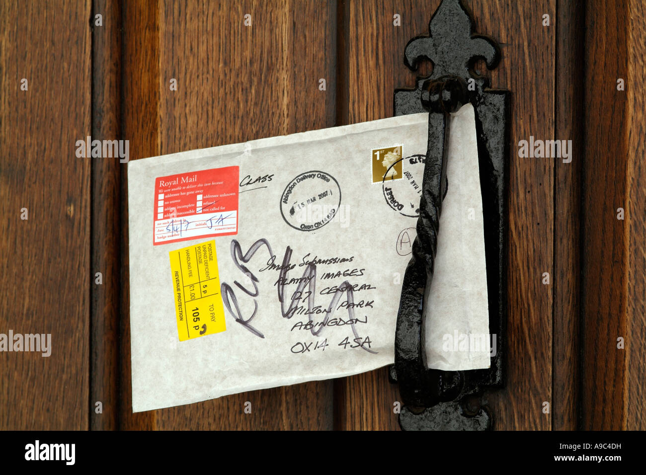 Royal Mail postal packet delivery A First Class postal package with ...