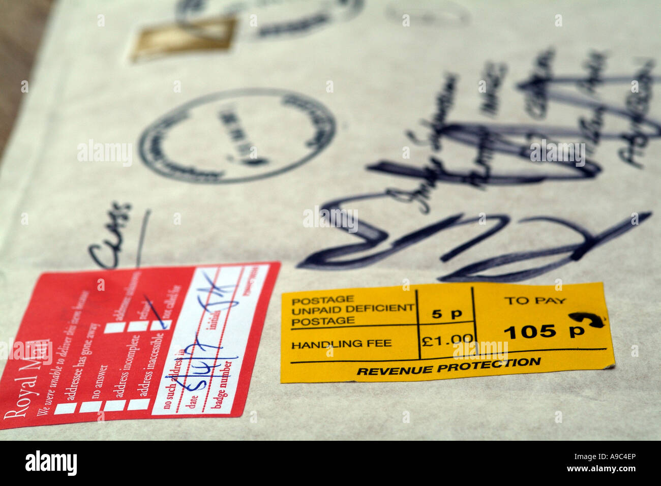 Royal Mail postal packet delivery A First Class postal package with ...