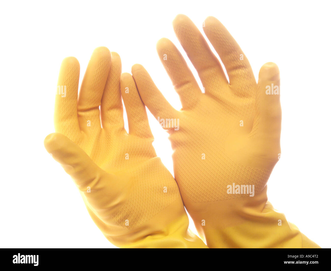 Hands in yellow rubber gloves Stock Photo - Alamy