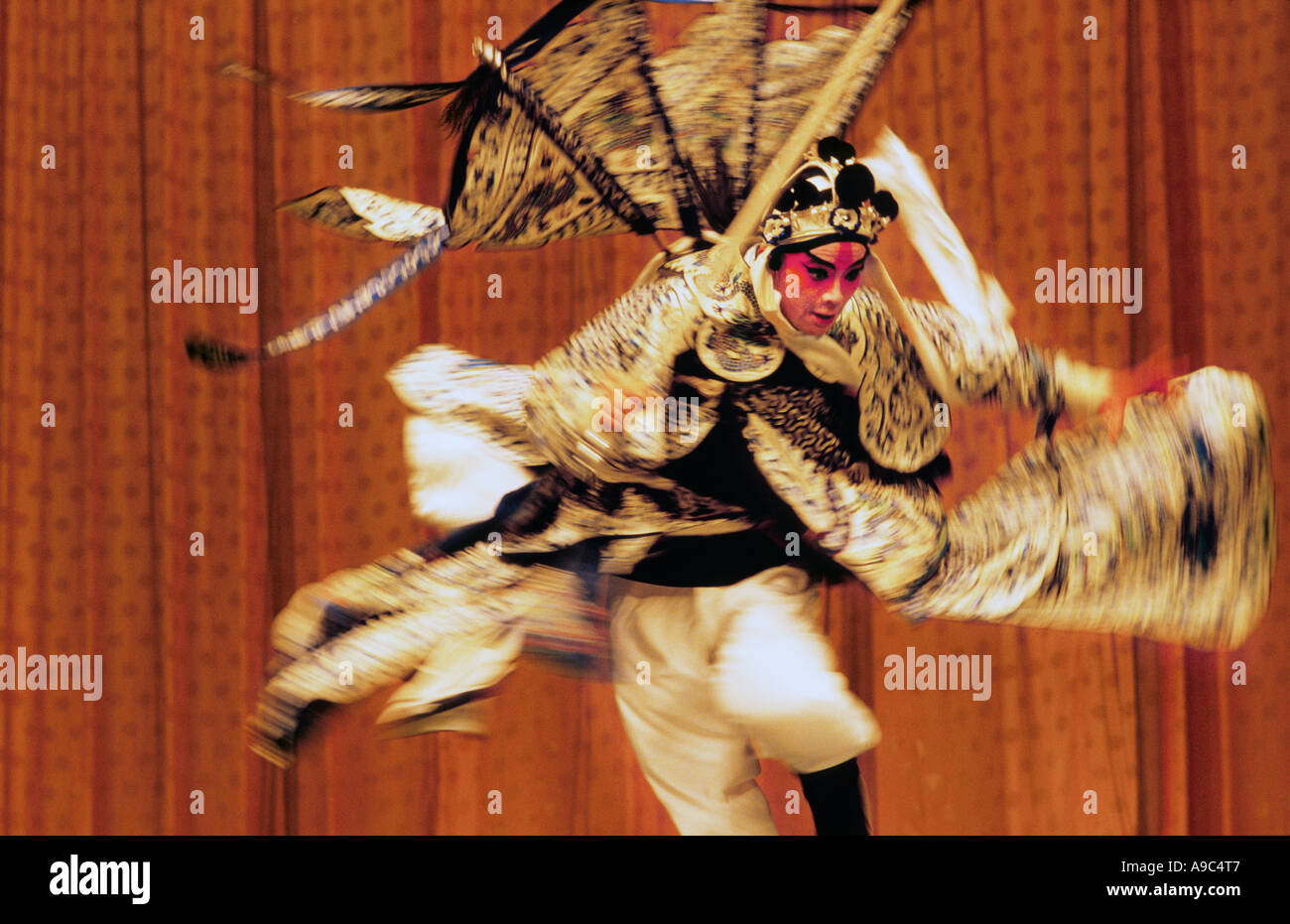 Acrobatic Peking opera actor turning on stage Stock Photo - Alamy