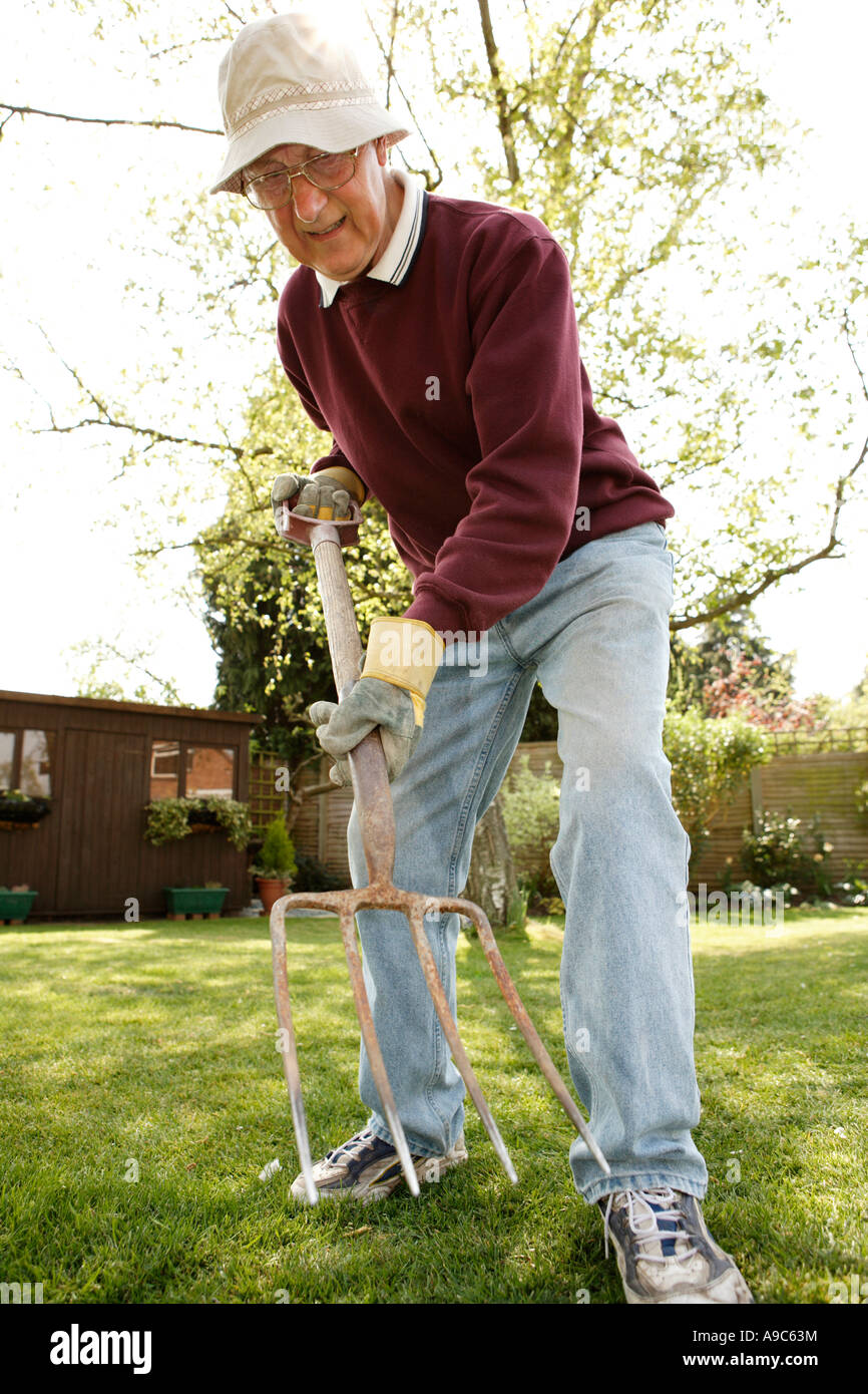 Male Gardener with Garden Fork Stock Photo - Alamy