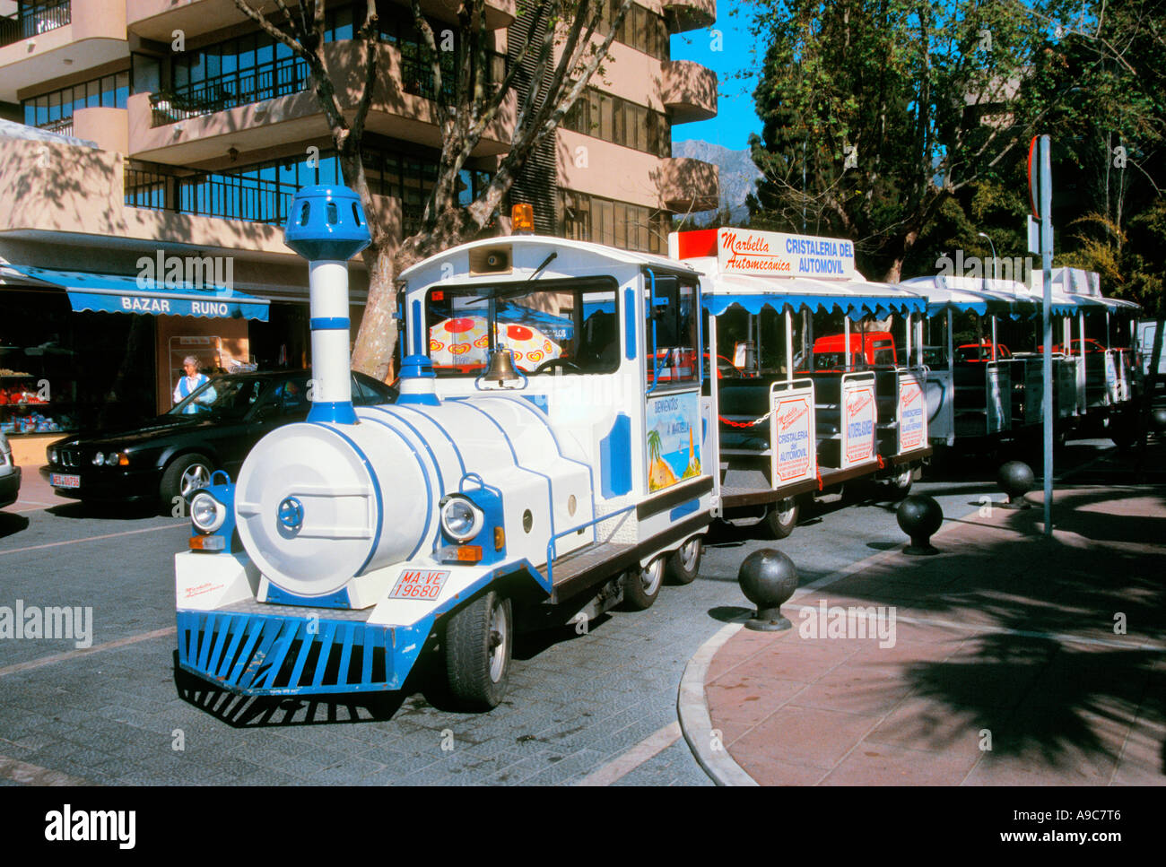 Tourist train in old town of Marbella Algatocin Costa del Sol Andalusia ...