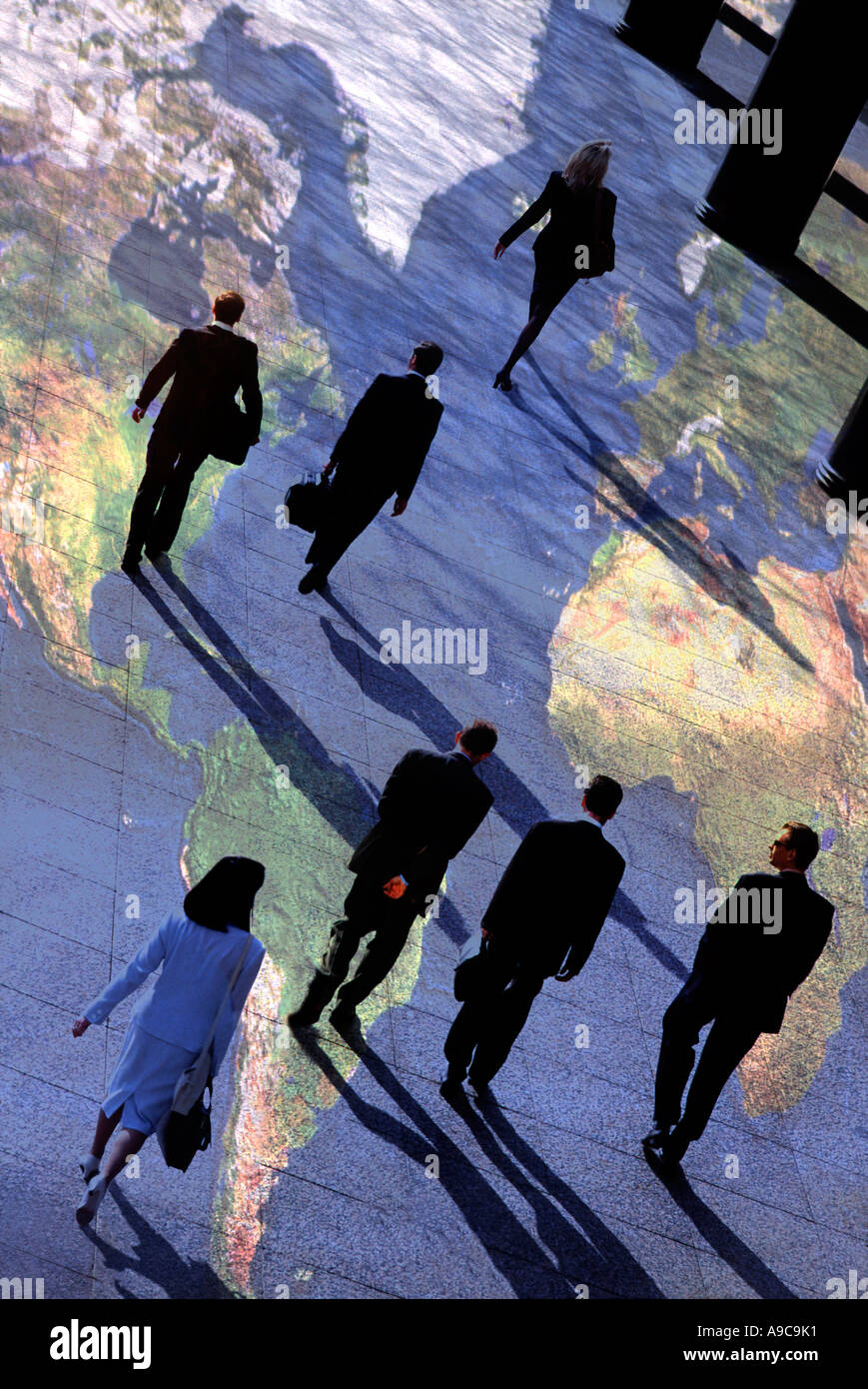 Executives On Map Stock Photo - Alamy