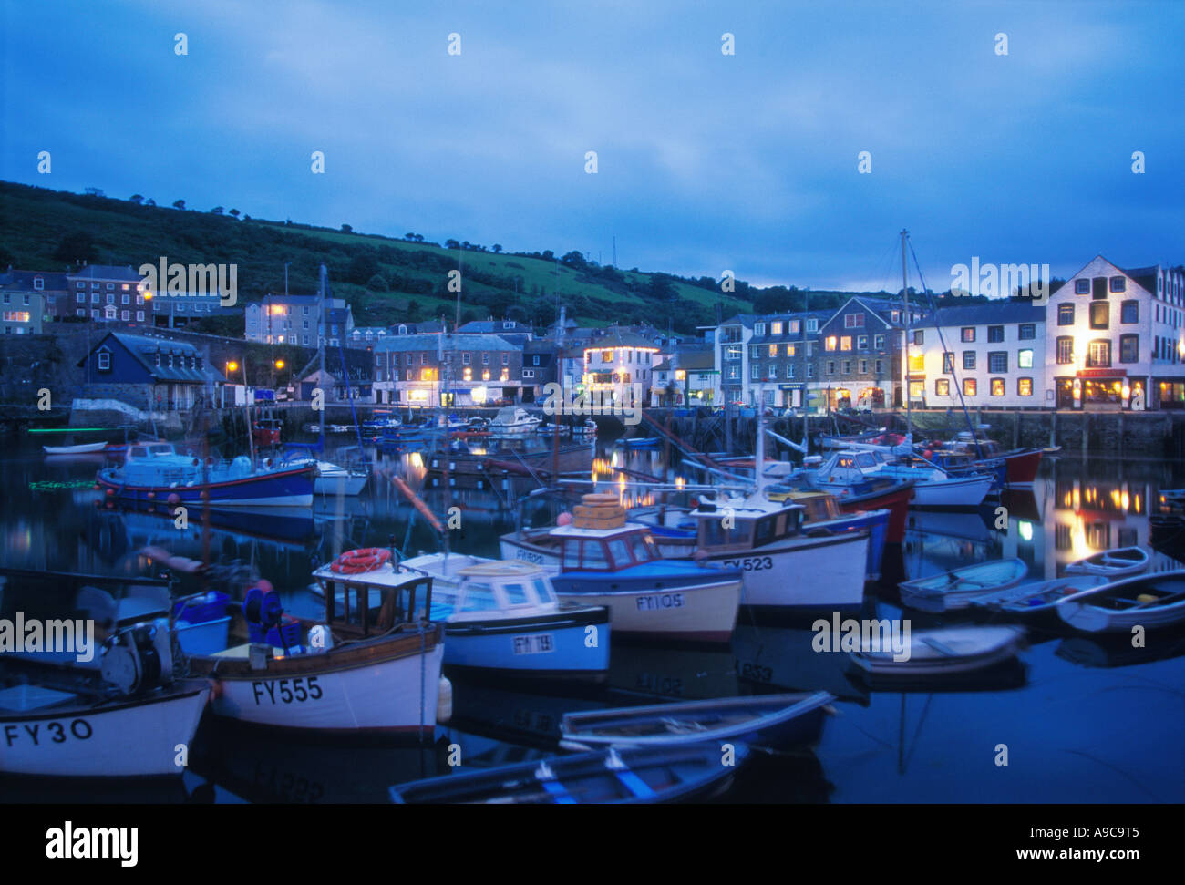 Fishing boats harbour at night Mevagissey Cornwall England Stock Photo ...