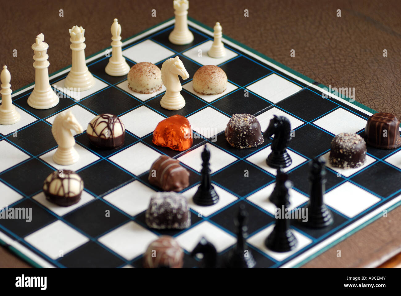 Fancy chocolates on a chess board Stock Photo - Alamy
