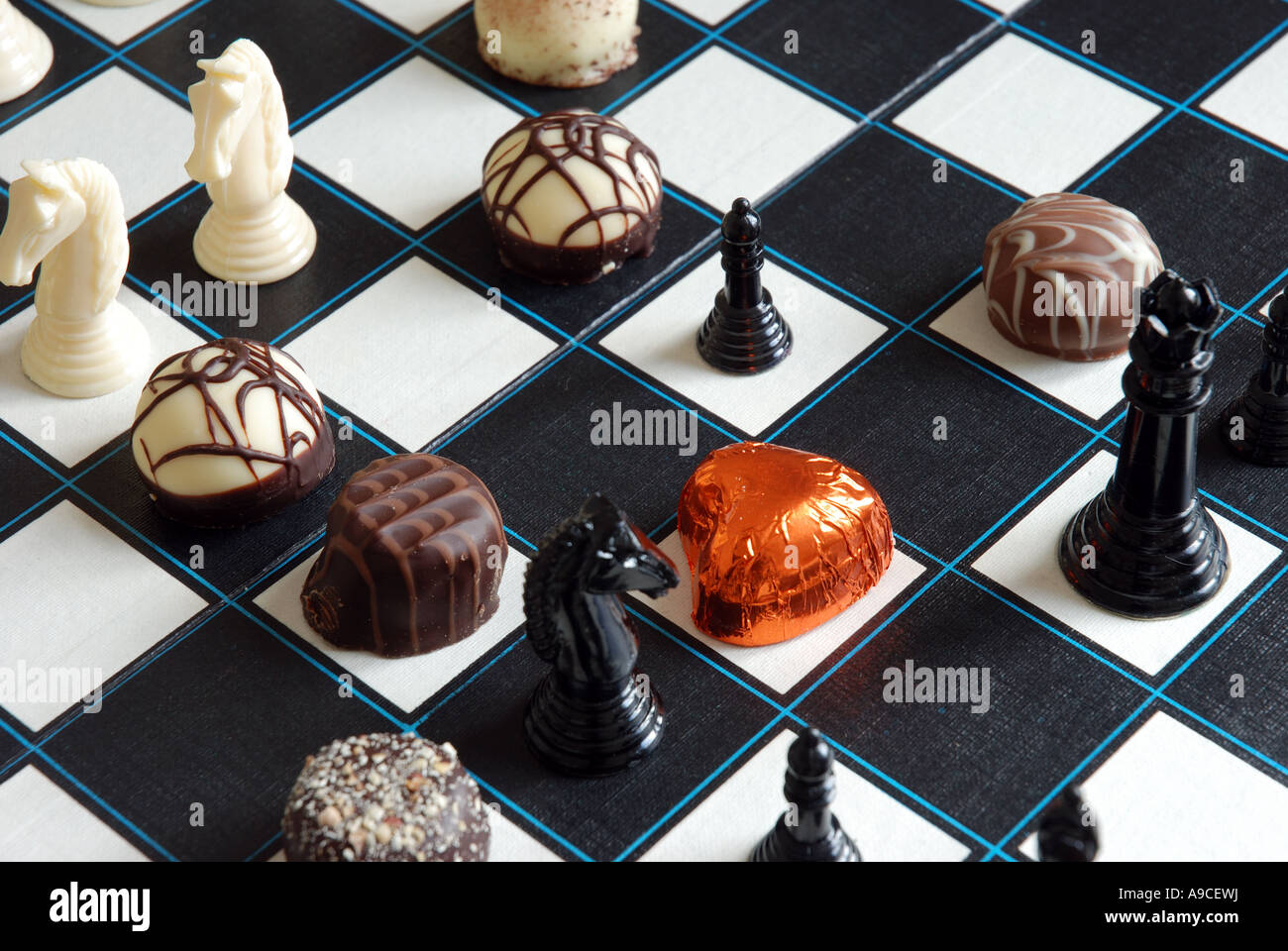 Fancy chocolates on a chess board Stock Photo - Alamy