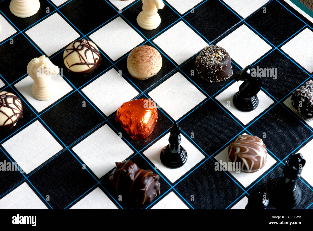 Fancy chocolates on a chess board Stock Photo - Alamy