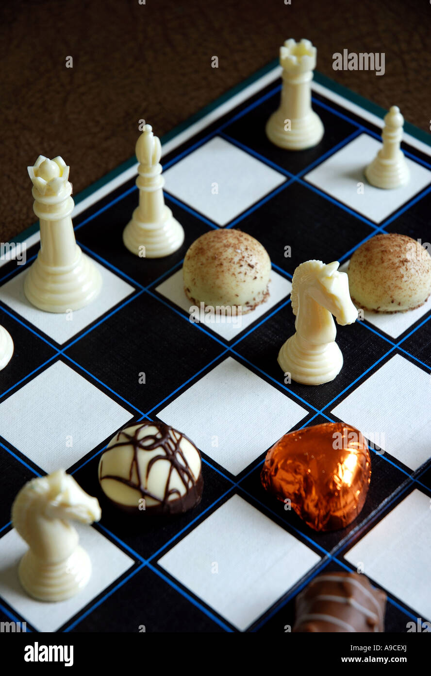 Fancy chocolates on a chess board Stock Photo - Alamy