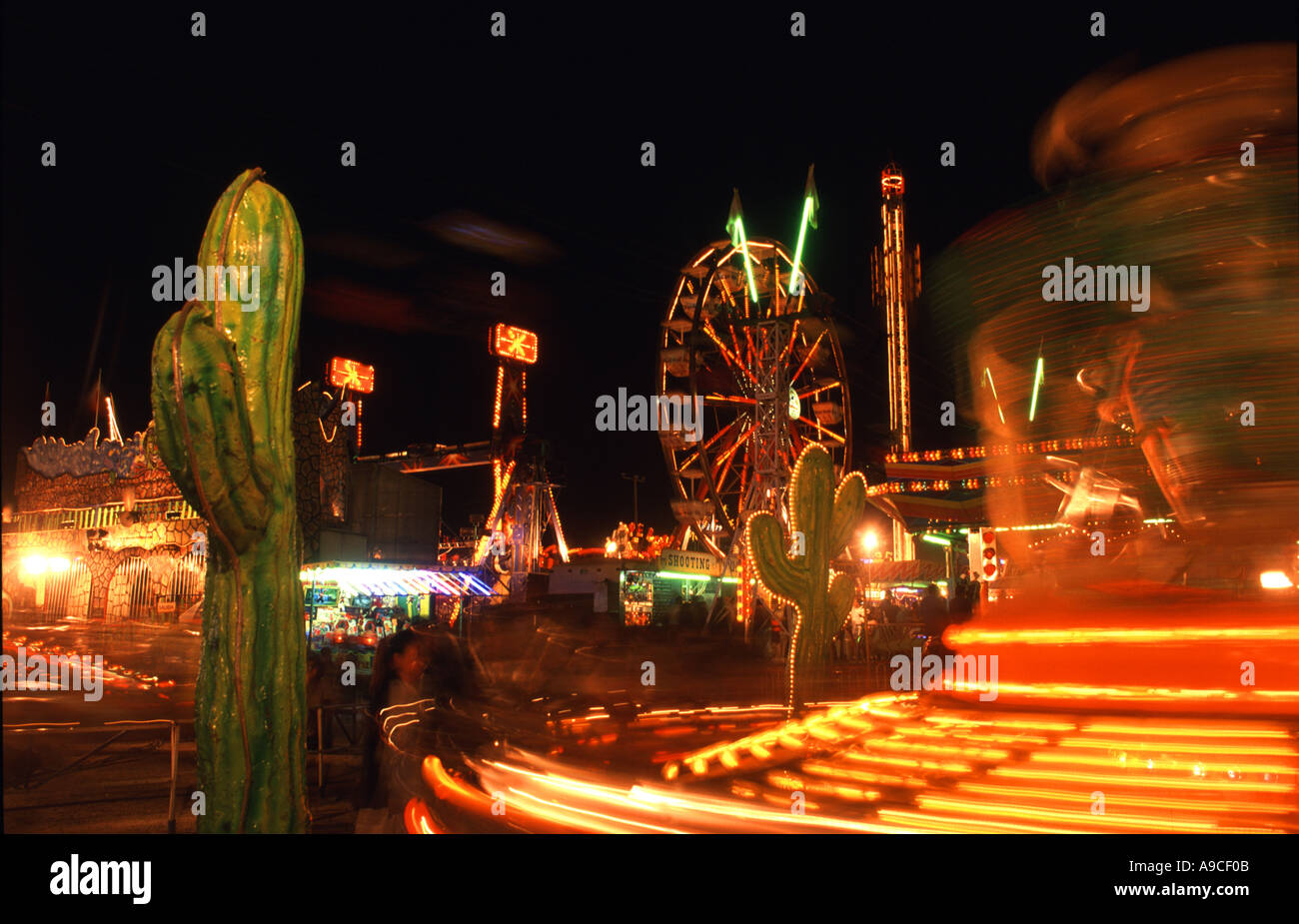 FAIRGROUND FAIR COLOUR mexico RIDE THRILL CHILDREN colourful MOTION ...