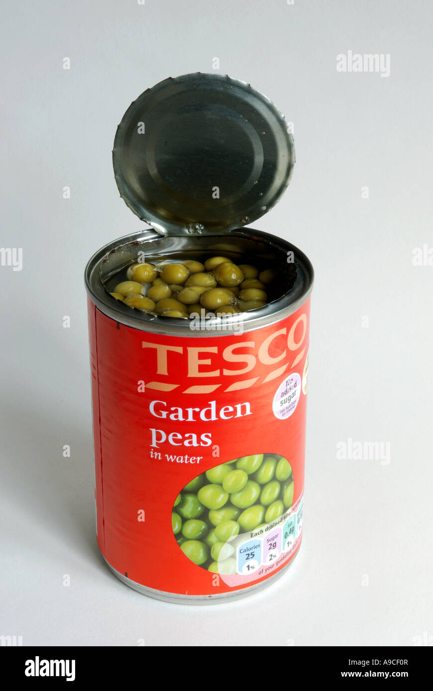 Can of Tesco garden peas in water, opened Stock Photo - Alamy
