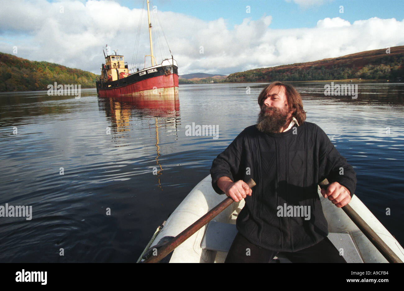 Clyde Puffer Eilean Easdale aka vital spark skipper rows back to boat ...