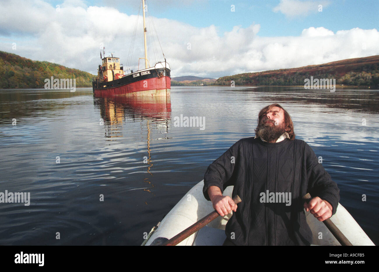 Clyde Puffer Eilean Easdale aka vital spark skipper rows back to boat ...