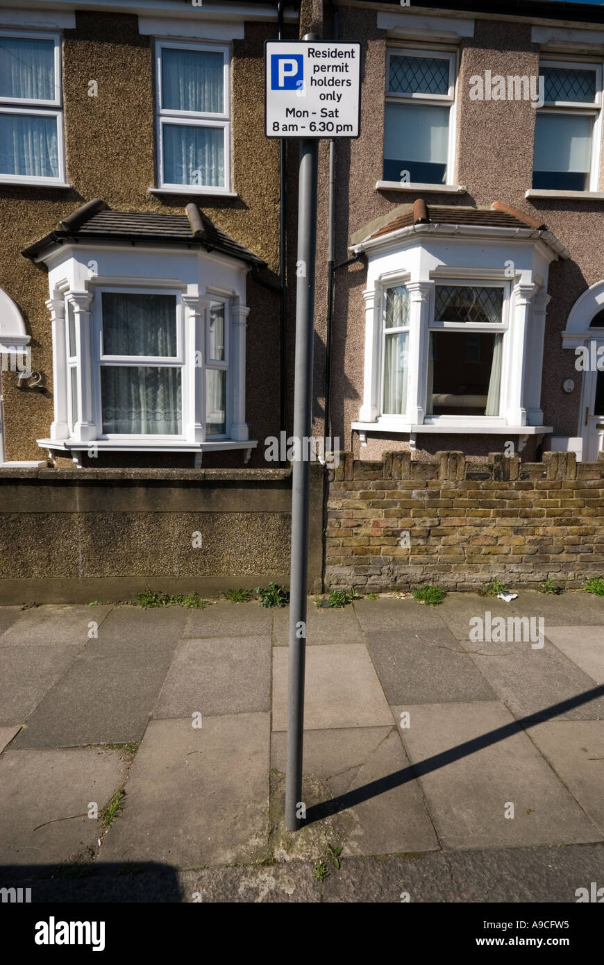 Traffic sign indicating times of parking in a controlled zone ...
