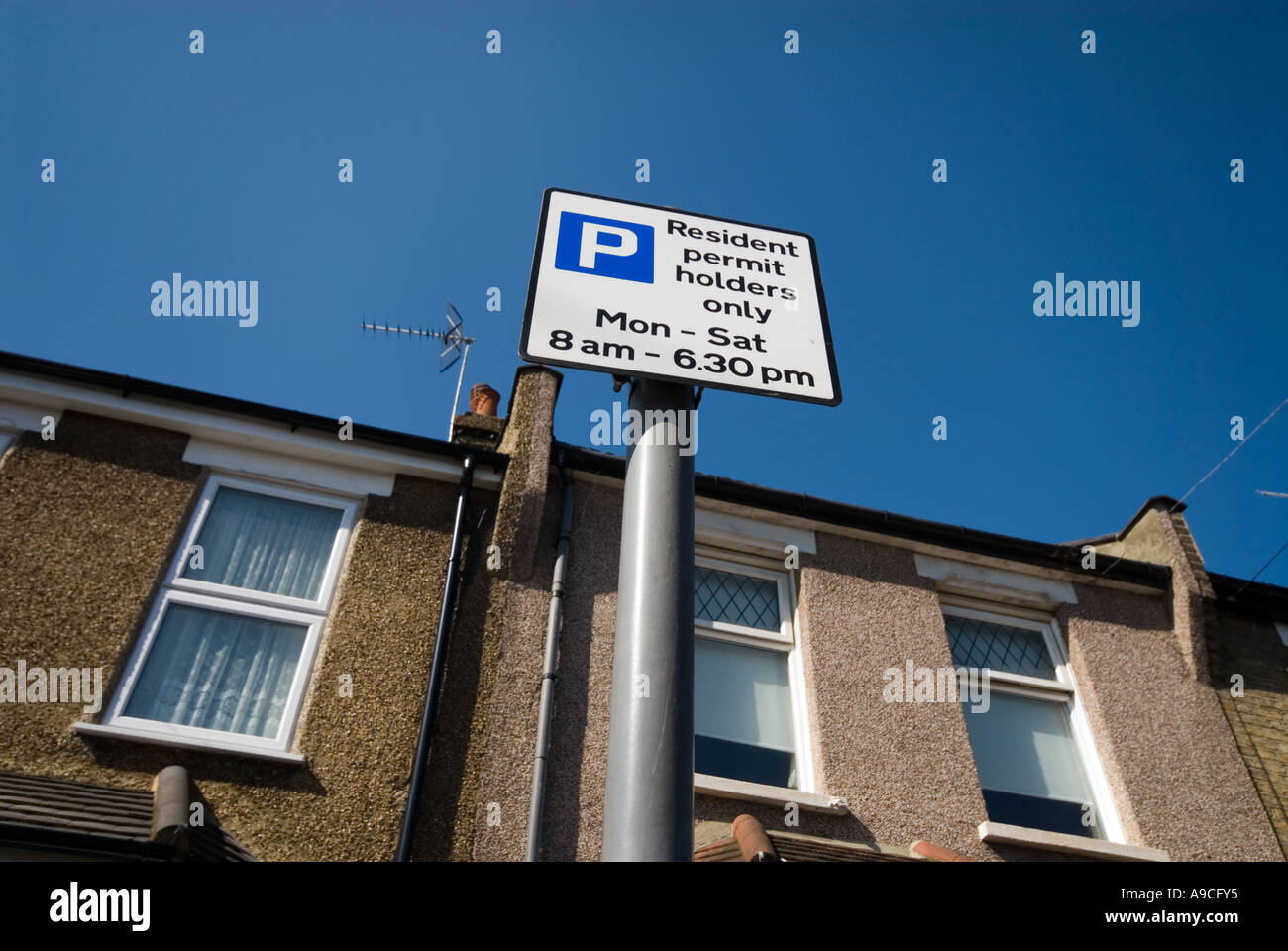 Traffic sign indicating times of parking controlled zone Stock Photo ...