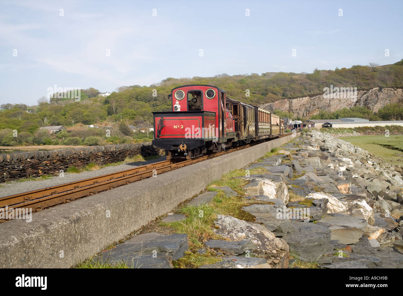 Narrow gauge steam train called Prince crossing the cob by Boston Lodge ...