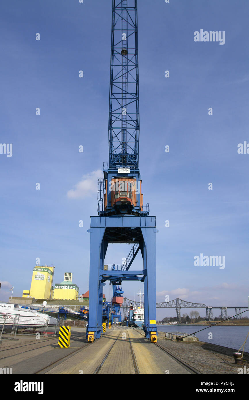 Cargo ship at harbour Suspension railway train Metal bridge Rendsburg ...
