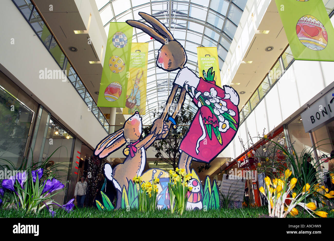 Easter rabbits figures decoration in shopping mall Stock Photo - Alamy