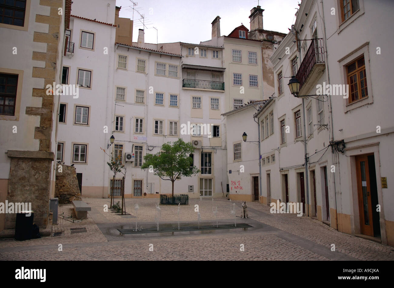 View of characteristic architecture little square white building court ...