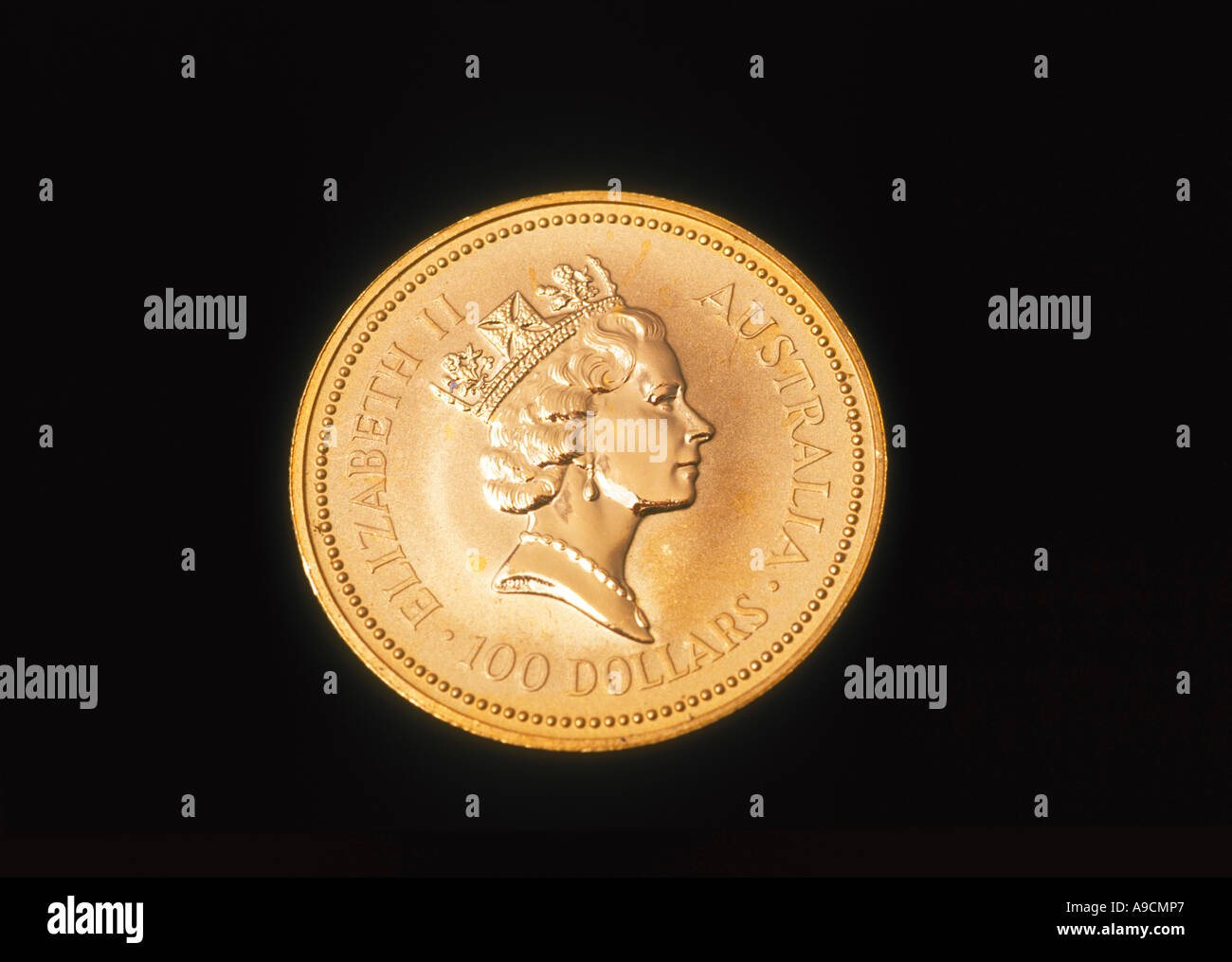 Gold coins bar golden Queen elisabeth elizabeth II Stock Photo - Alamy