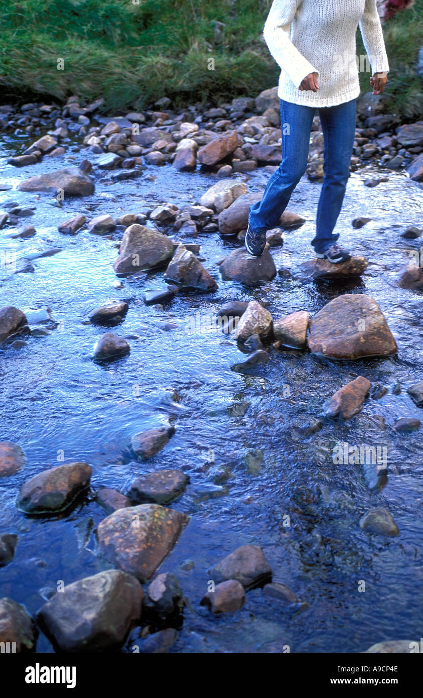 Women Jumping Stream Stock Photo - Alamy