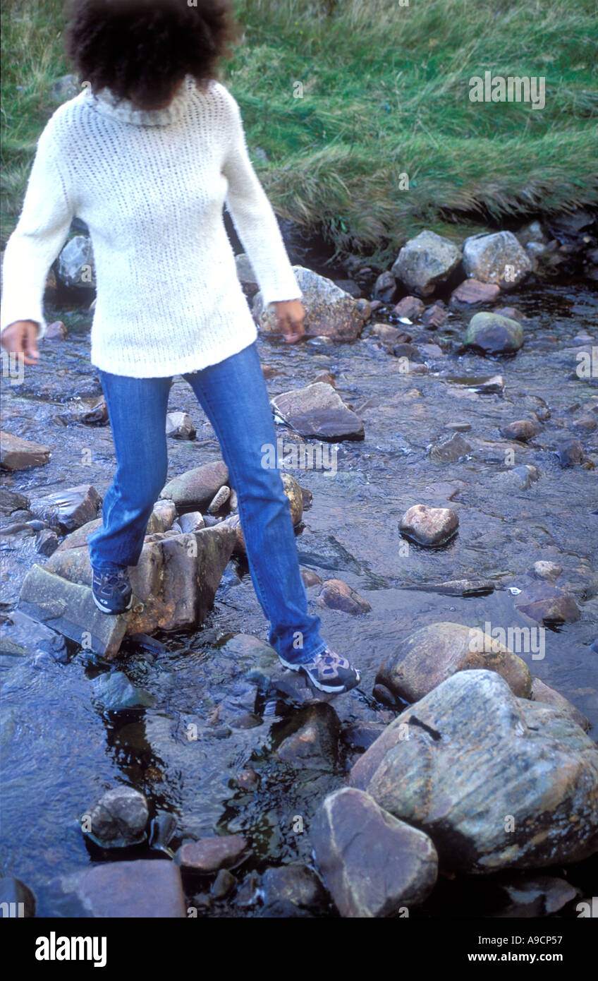 Women Jumping Stream Stock Photo - Alamy