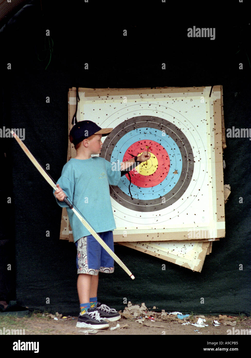 A SEVEN YEAR OLD BOY PLAYING ARCHERY BAPN 508 Stock Photo - Alamy