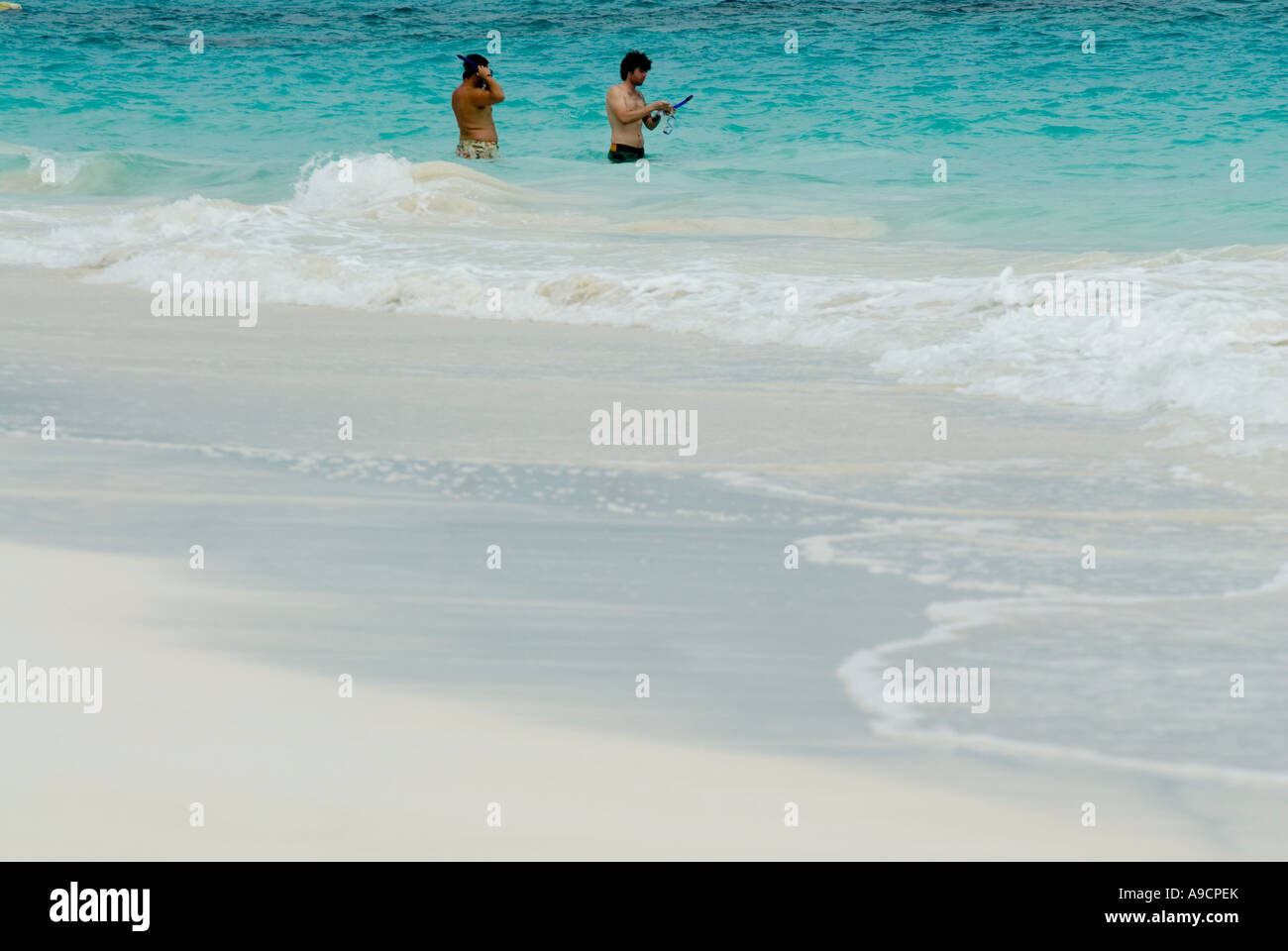 Tulum people have a bath in the caribben sea Stock Photo - Alamy