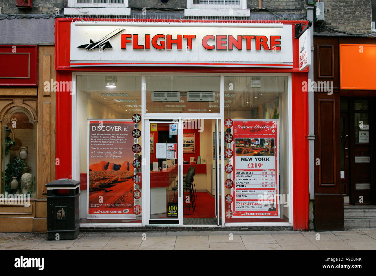 flight centre shop front window display Stock Photo - Alamy