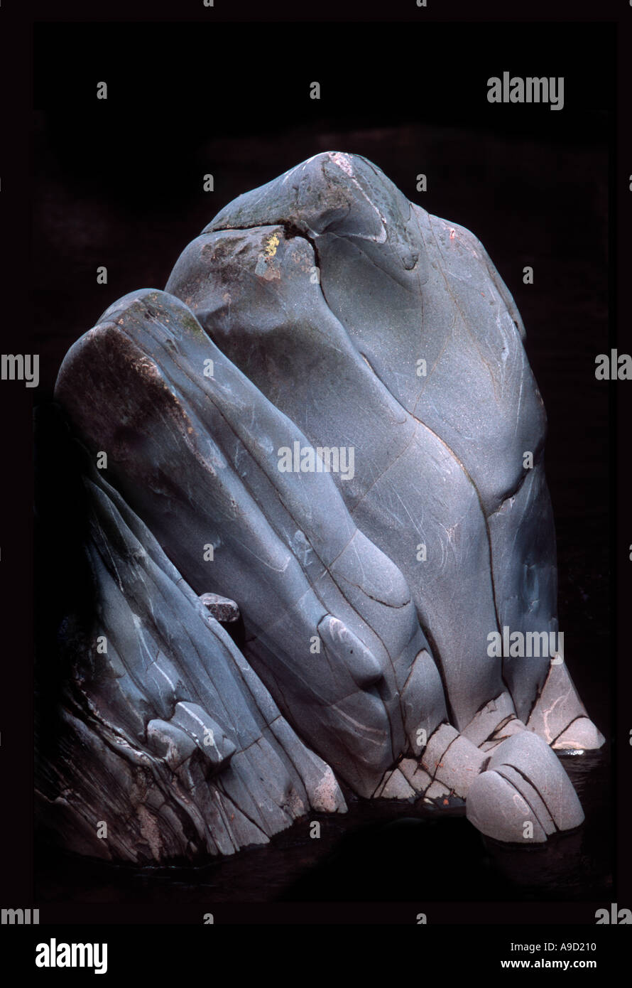 Rocks worn by river Stock Photo - Alamy