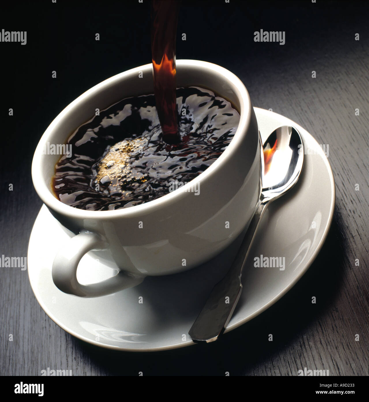 pouring Coffee in cup Stock Photo - Alamy