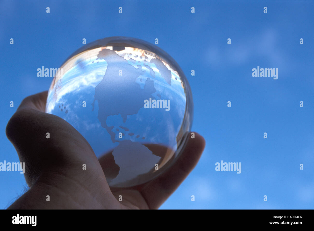 Hand grasping earth hi-res stock photography and images - Alamy