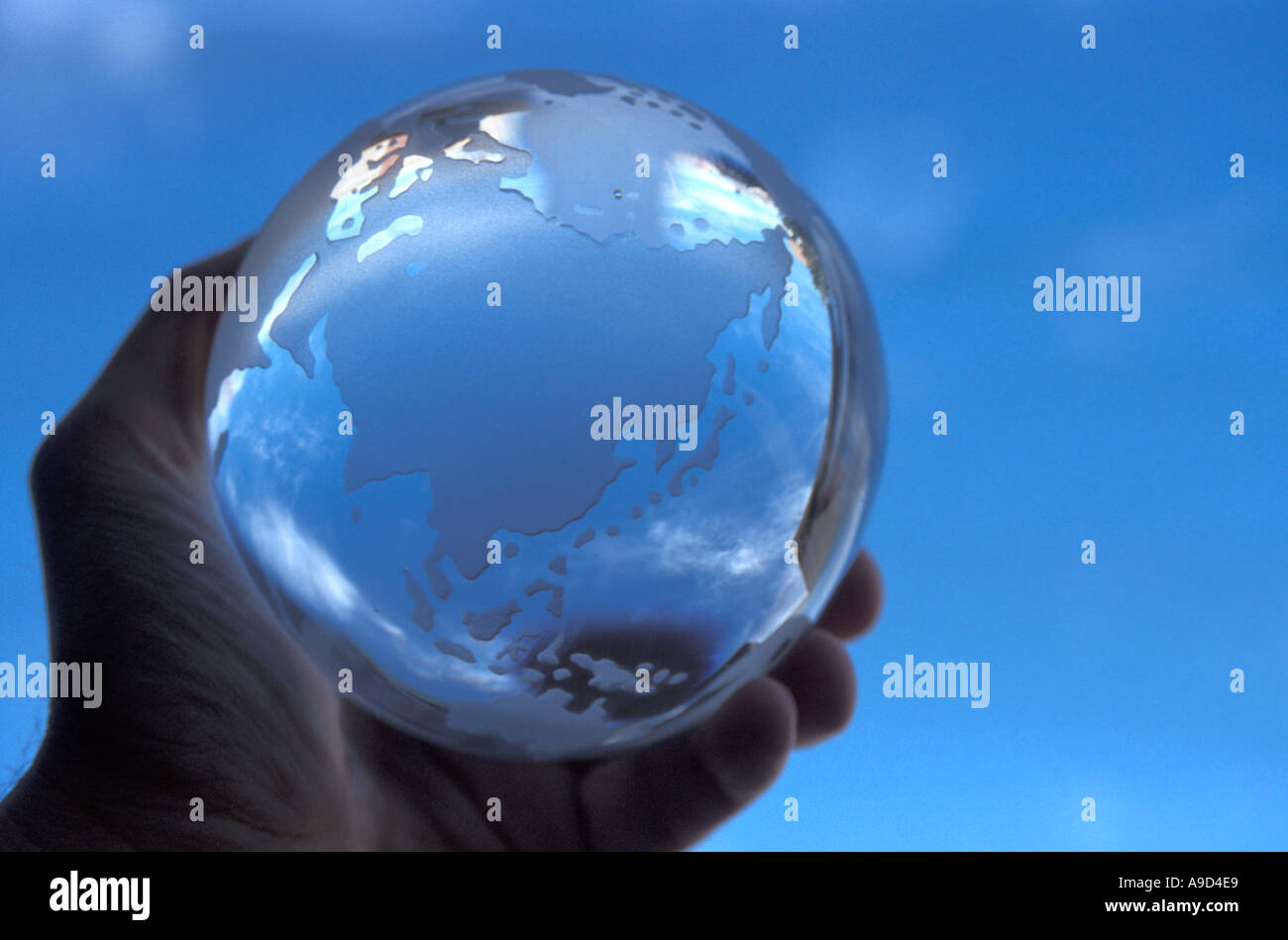 Hand grasping earth hi-res stock photography and images - Alamy