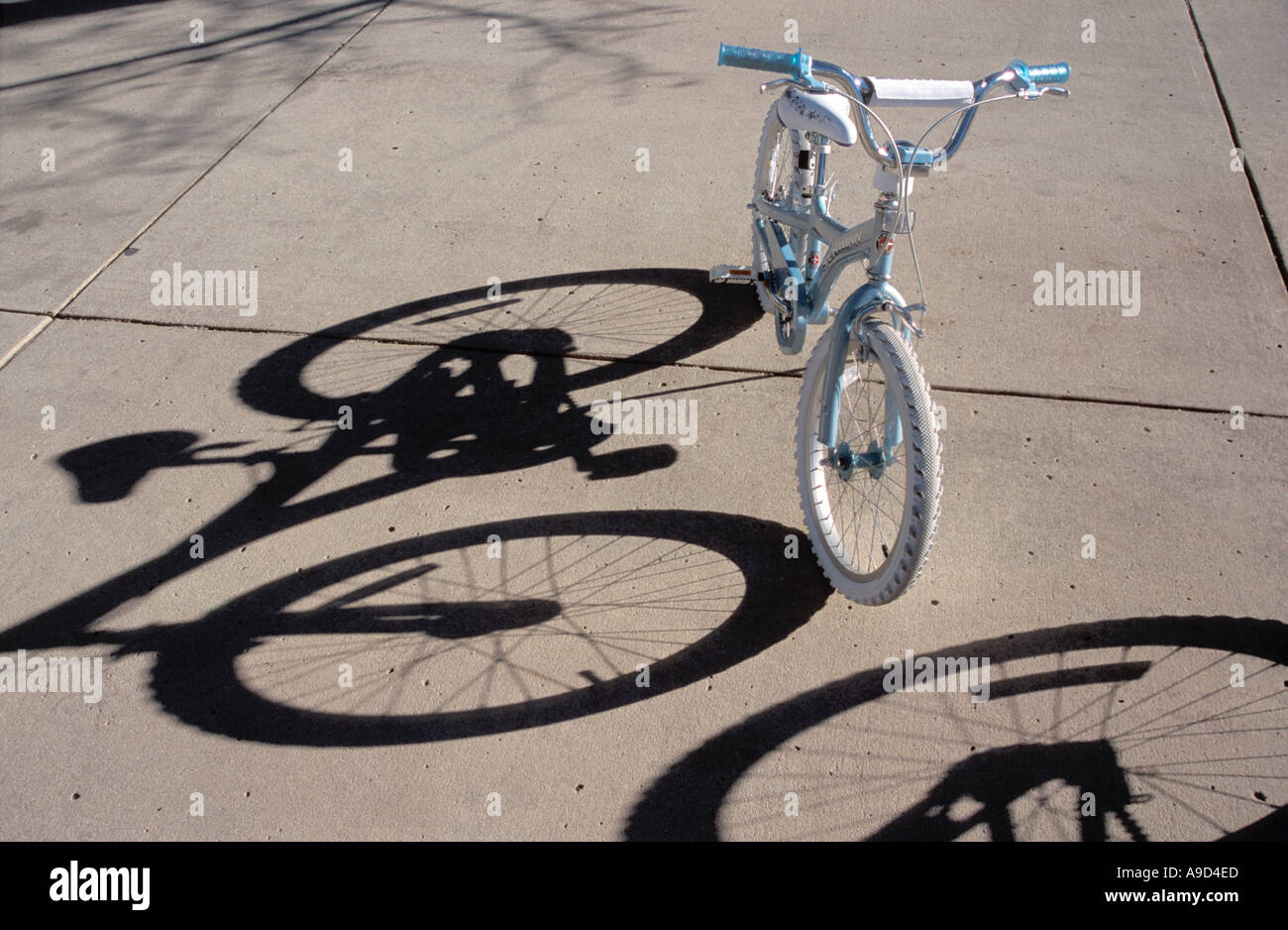 Bicycle shadow 1 Stock Photo - Alamy