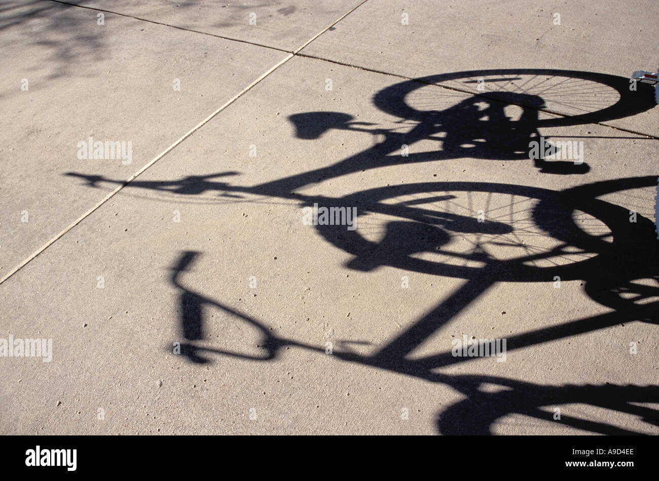 Bicycle shadow 2 Stock Photo - Alamy