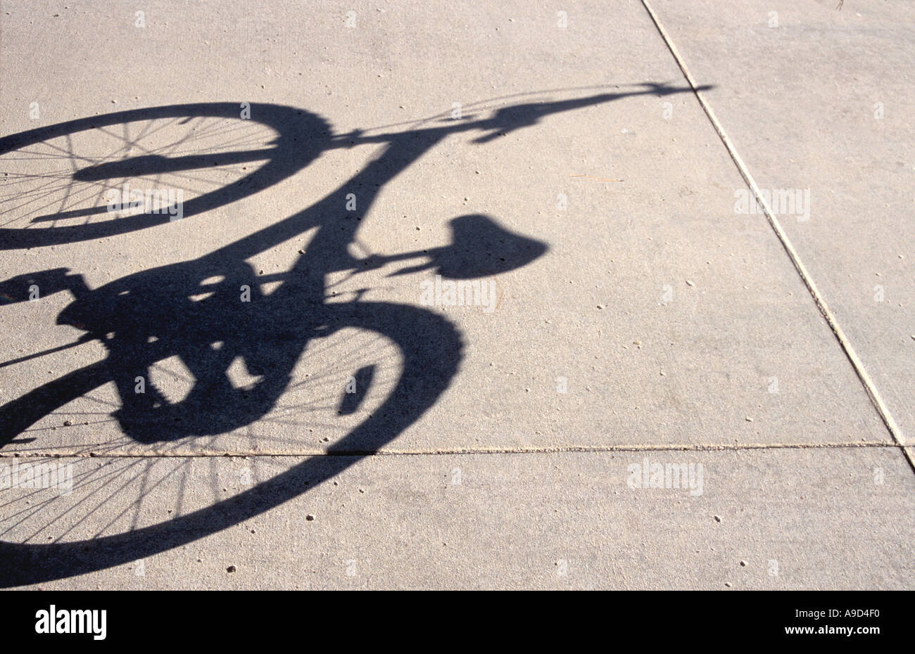 Bicycle shadow 4 Stock Photo - Alamy