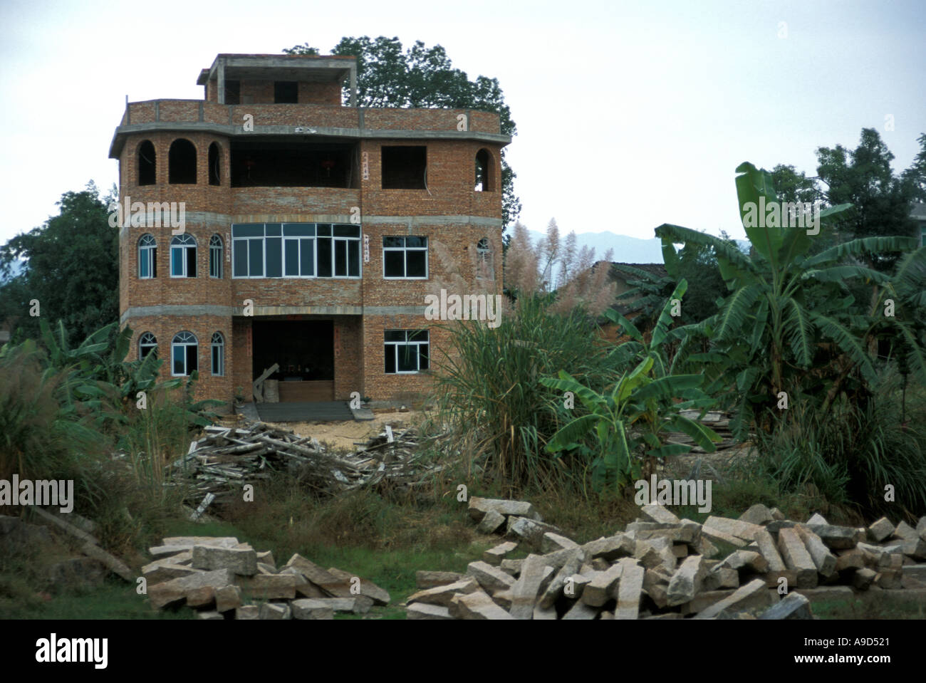 Rural Chinese multi family home Stock Photo - Alamy