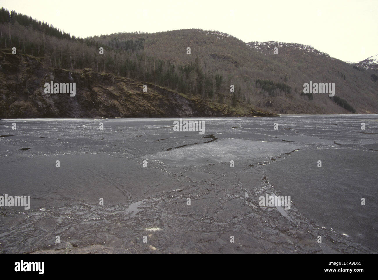 ice covered lake near vossestrand norway Stock Photo - Alamy