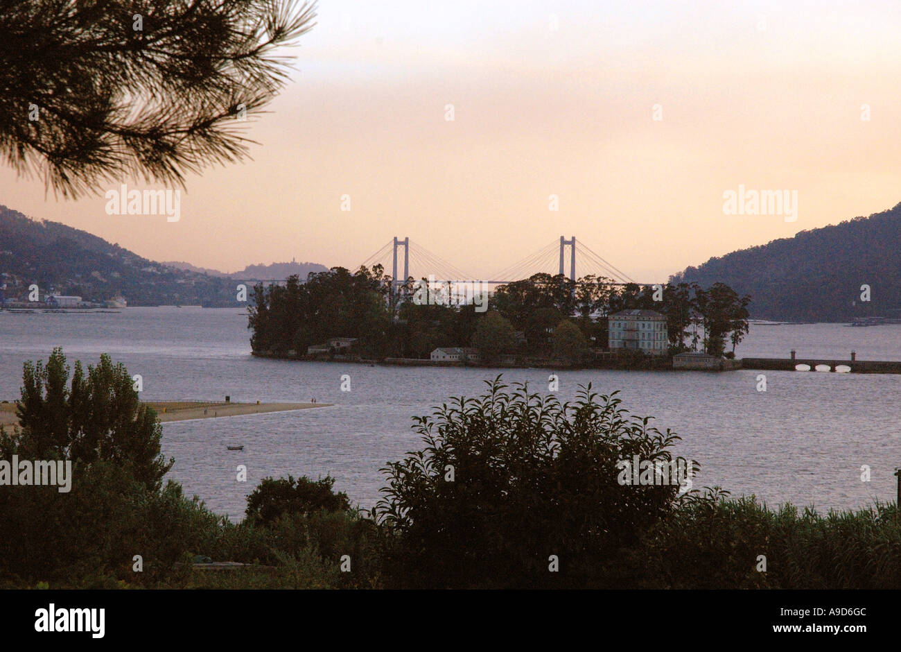 Distant view of the modern suspended bridge in the Ria de Vigo Chapela ...