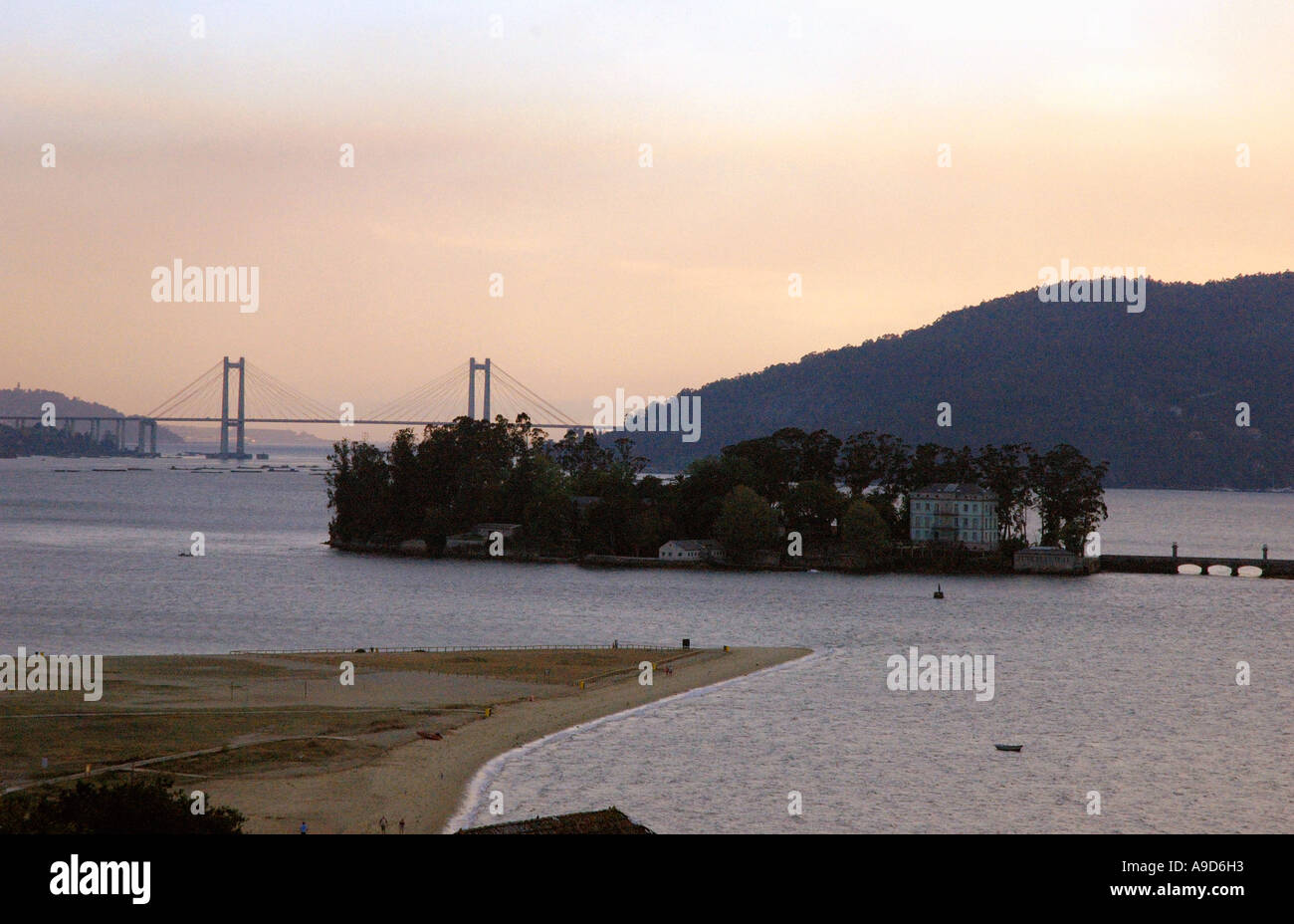 Distant view of the modern suspended bridge in the Ria di Vigo Chapela ...