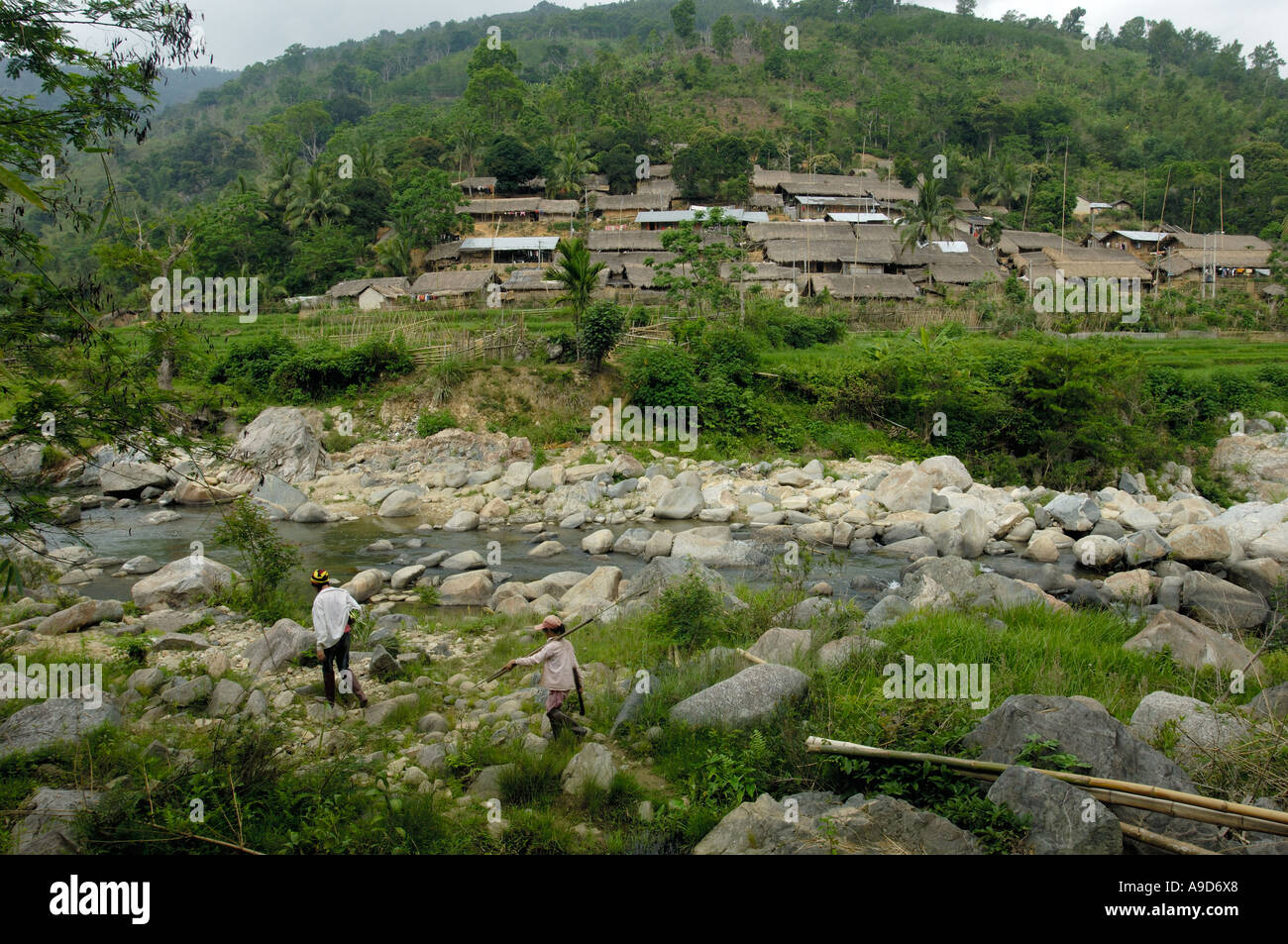 Chubao Li nationality village with thatch houses at western foot of ...