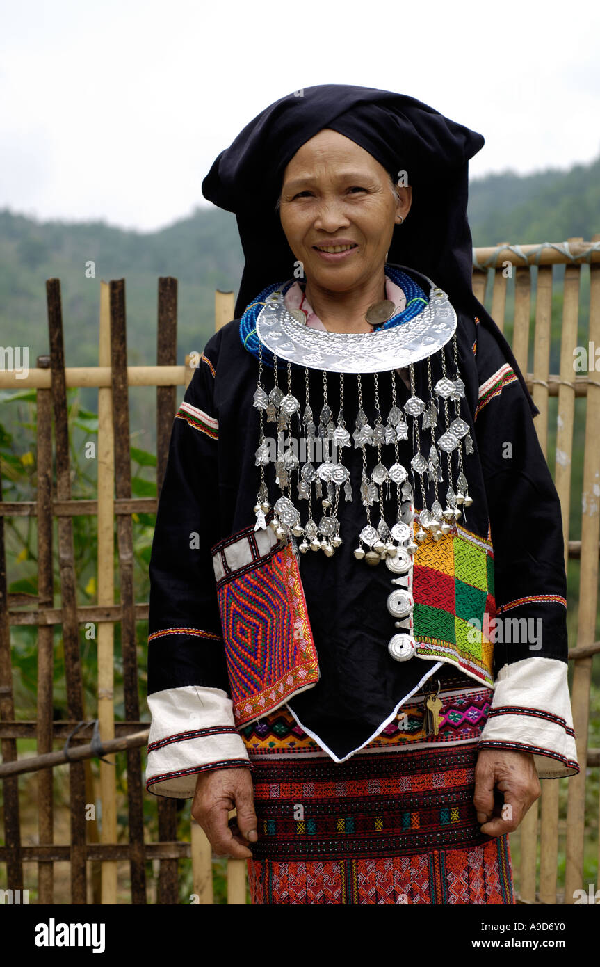 A woman of Li nationality with traditional dress in a village in ...