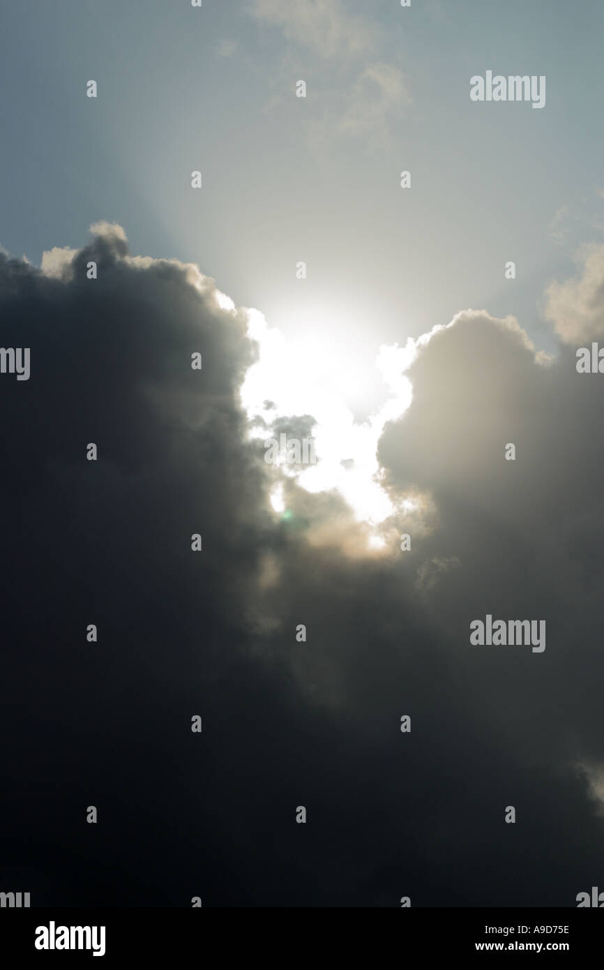 sun behind cloud Stock Photo - Alamy