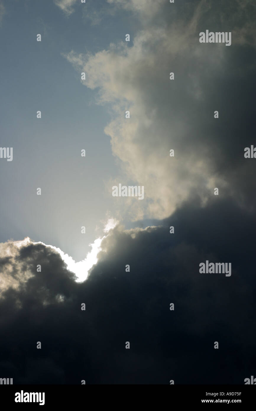 sun behind cloud Stock Photo - Alamy